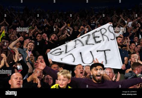 Manchester United Fans In The Stands With A Glazers Out Banner To