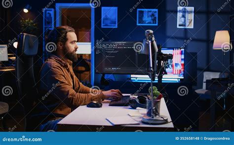 Programmer Developing Code On Computer Screen While In Personal Office