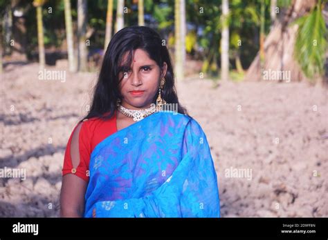 Close Up Of An Indian Bengali Teenage Girl Wearing Blue Sari Earrings