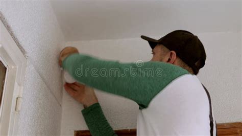 Worker Activating Programming Setting A Burglary Security System Alarm Manual Stock Footage