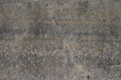 Surface Textures Showcase Natural Wear And Tear In Gray Concrete Under