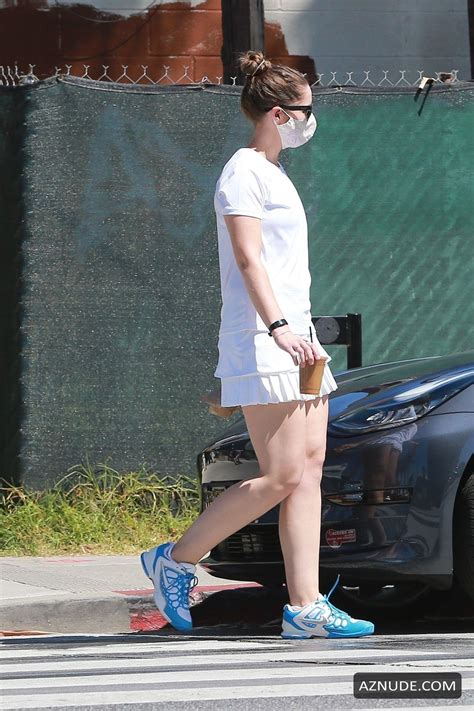 Christina Schwarzenegger Wears Her Hair Up In A Bun While Out During A