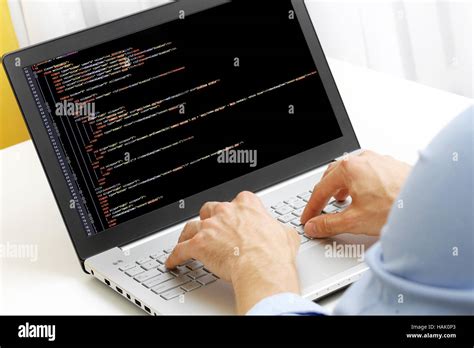 Programmer Profession Man Writing Programming Code On Laptop Computer Stock Photo Alamy