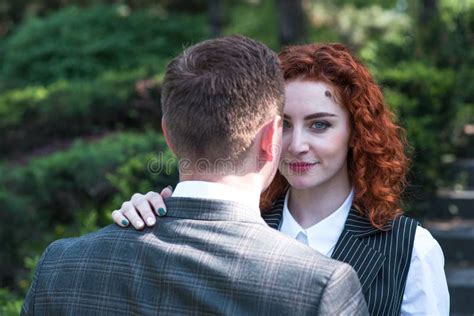 Redhead Couple Portrait Of Redhead With Curly Hair Wife And Defocused