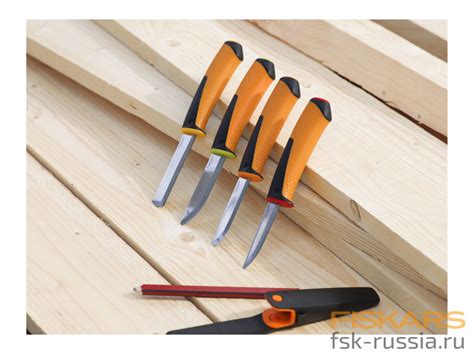 Нож строительный со встроенной точилкой Fiskars 1023620 - Строительные ...