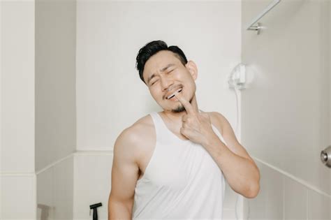 Premium Photo Funny Face Expression Of Man Try To Poop In The Toilet