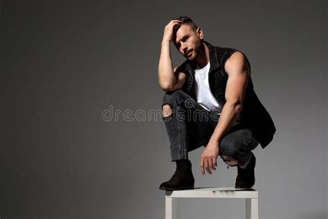 Pensive Man Squatting Down In Bare Feet Stock Image Image Of Bright