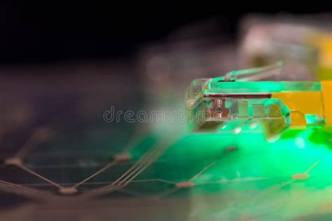 Yellow Internet Switch Plastic Circuit Board Glowing Optical Fibres