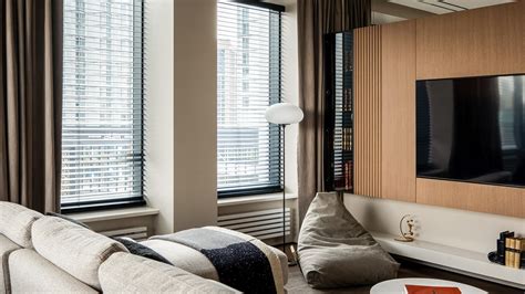 Сдержанный интерьер квартиры с необычной мягкой мебелью — проект Cтудии дизайна интерьеров «top