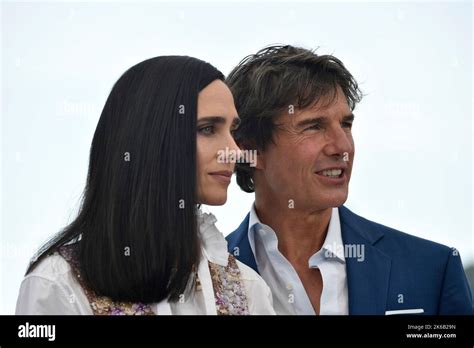 Actor Tom Cruise And Actress Jennifer Connelly Posing During The