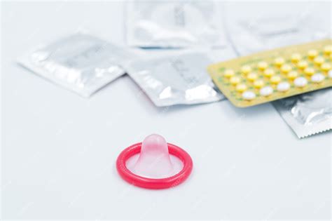 Premium Photo Condom With Contraceptive Birth Control Pill Safe Sex