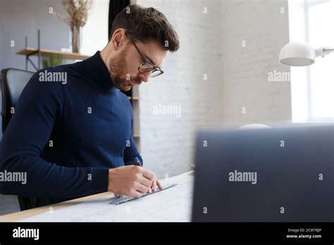 Architect Working In Office With Blueprintsengineer Inspect Architectural Plan Sketching A