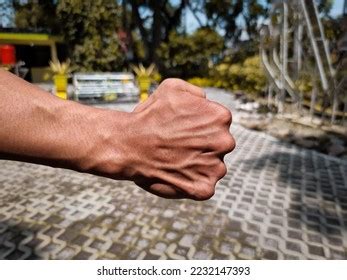 Man Showing Big Dashing Muscles Outdoor Stock Photo Shutterstock