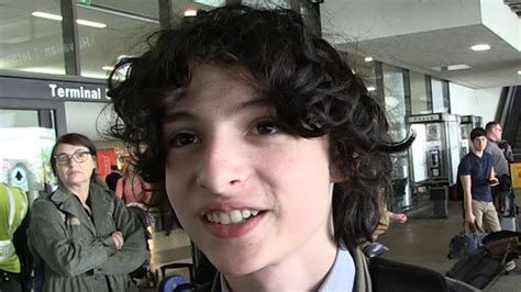 Stranger Things Star Finn Wolfhard Talks Kissing Millie Bobby Brown