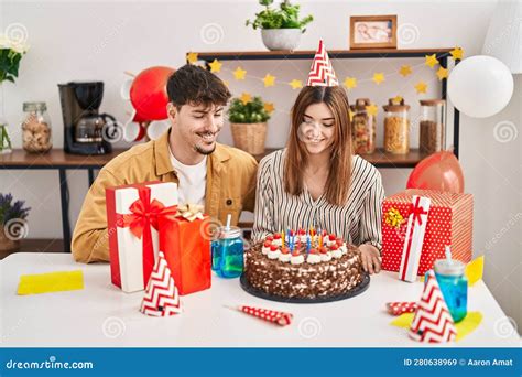 Mand And Woman Couple Having Birthday Celebration At Home Stock Image