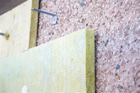 Premium Photo External Repair Work On The Building Insulation And