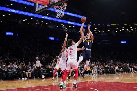 Jokic Porter Murray Power Nuggets To 108 102 Win Over Nets Sentinel