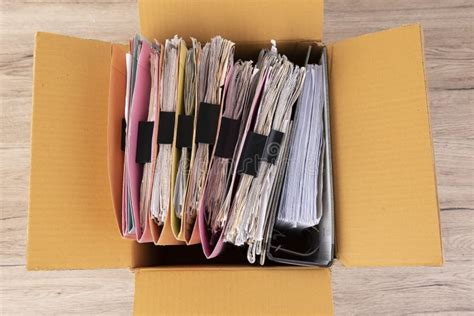 The Documents And Files Are Placed In A Brown Box Stock Image Image Of Files Management