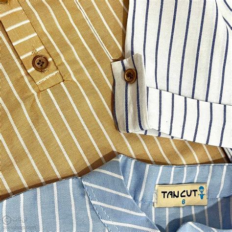 پیراهن یقه ایستاده آستین پاکتی آبی تن کات Tan Cut فروشگاه کودک اُرِس