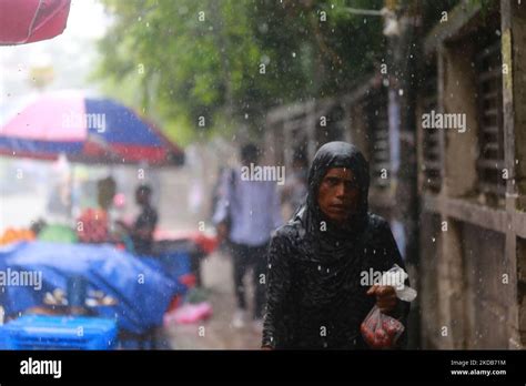 A Woman Wet In The Rain During The Rainfall In Dhaka Bangladesh On May
