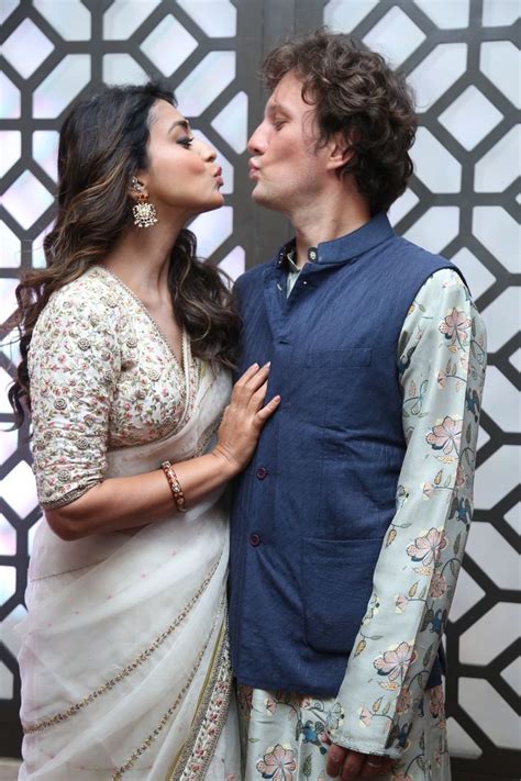 Shriya Saran With Her Hubby Lip Kiss At Gamanam Pre Release Event