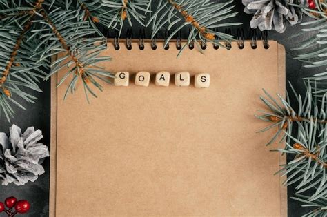 Premium Photo Open Brown Kraft Paper Folded Notebook With Goals