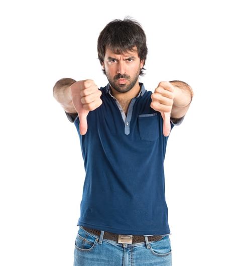 Free Photo Man Doing A Bad Signal Over White Background