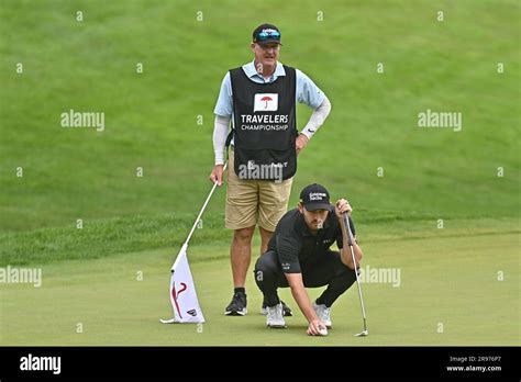 Saturday June 24 2023 Patrick Cantlay And Caddie Joe Lacava Look Over