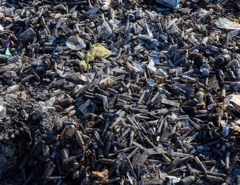 Premium Photo Solid Waste Dumping Site With Test Tubes And Lab Wastage