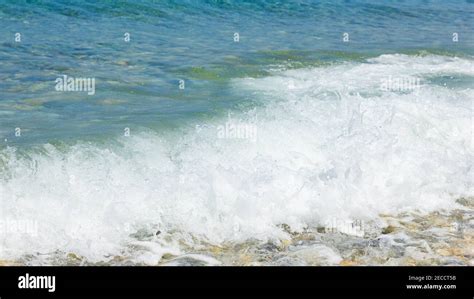 Sea Wave And Pebble Summer Vacation Concept Sea Wave With Foam Incident On The Coastal Shingle