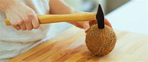 Closeup On Woman Opening Coconut Using Hammer Stock Image Image Of Clean Apartment 287881177