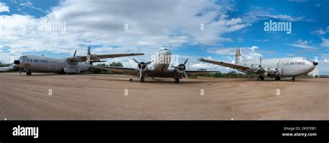 A Panoramic View Of Three Military Cargo Aircraft On Display At The