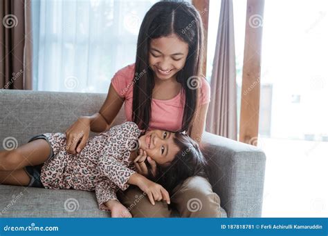 Asian Cute Happy Sibling Sister Smiling Stock Image Image Of Couch