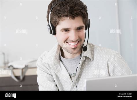 Portrait Of Man Wearing Headset Stock Photo Alamy