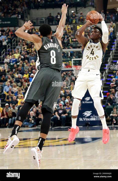 Indiana Pacers Guard Victor Oladipo 4 Shoots The Basketball Defended