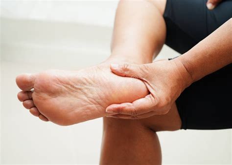 Asian Woman Check Feet With Crack And Dry Heel Skin Diabetic Foot Stock Image Image Of Crack