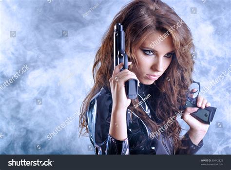 Beautiful Sexy Girl Holding Gun Smoke库存照片30442822 Shutterstock