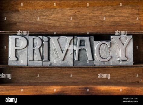 Privacy Word Made From Metallic Letterpress Type On Wooden Tray Stock