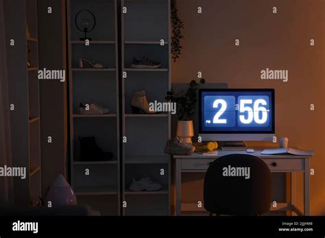 Shelf Units With Different Shoes And Workplace With Modern Computer In