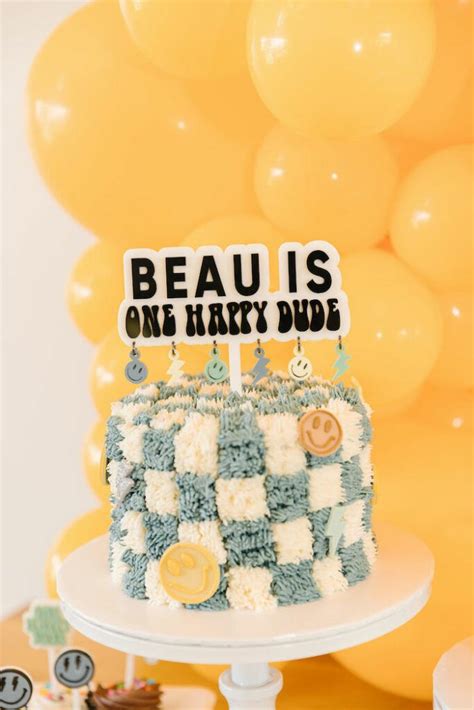 A Birthday Cake Sitting On Top Of A Table