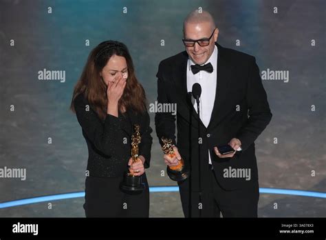 Shirin Sohani Left And Hossein Molayemi Accepts The Award For Best