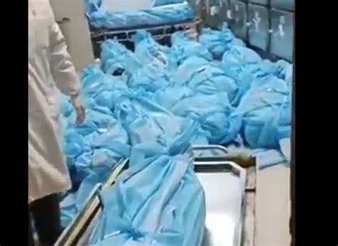 Watch Dead Bodies Wrapped In Plastic Pile Up On Hospital Floor In