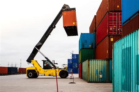 Premium Photo Forklift Handling Cargo Container Freight Container