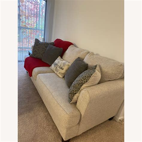 Ashley Furniture Wide Alcona Sofa AptDeco