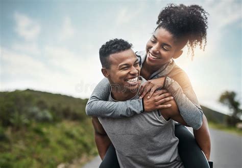 Ill Always Have Your Back A Handsome Young Sportsman Piggybacking His