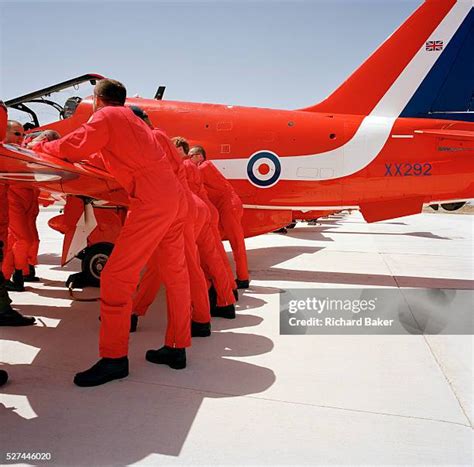 Red Arrows Pilots Red Photos And Premium High Res Pictures Getty Images