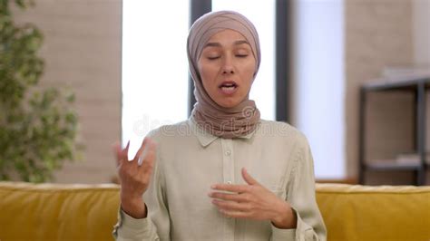 Camera Pov Portrait Of Young Emotional Muslim Woman Influencer In