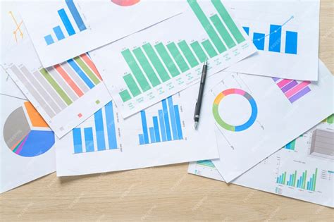 Premium Photo Top View Of Documents With Analytics Data Lying On Tableselective Focusx9