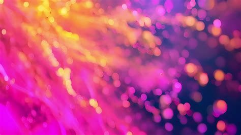 Vibrant strokes of pink and yellow paint create a striking visual of ...