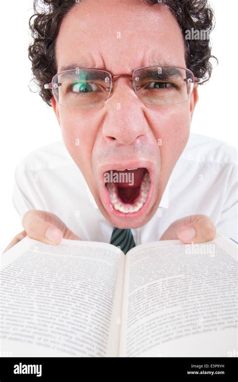 Close Up Of Angry Nerd In Shirt And Tie With Glasses Holding Open Book